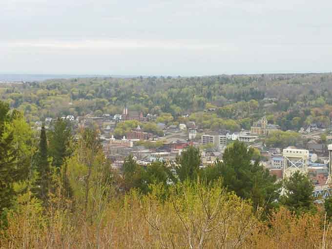 Aerial views reveal how Houghton hugs the hillside like it's afraid of missing the water show.
