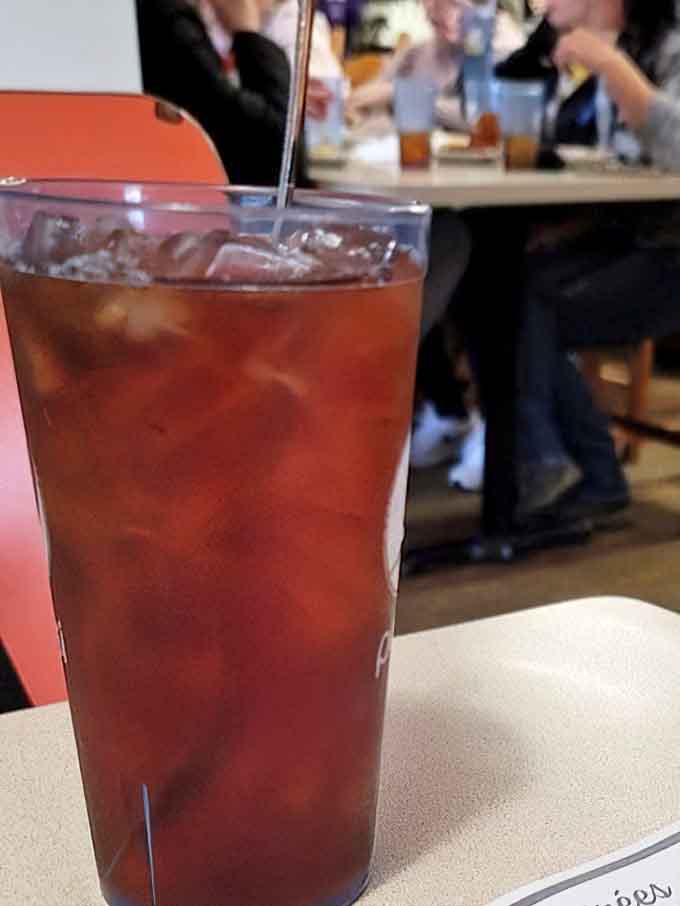 Iced tea in a proper tall glass, because some things should never change in a good diner.