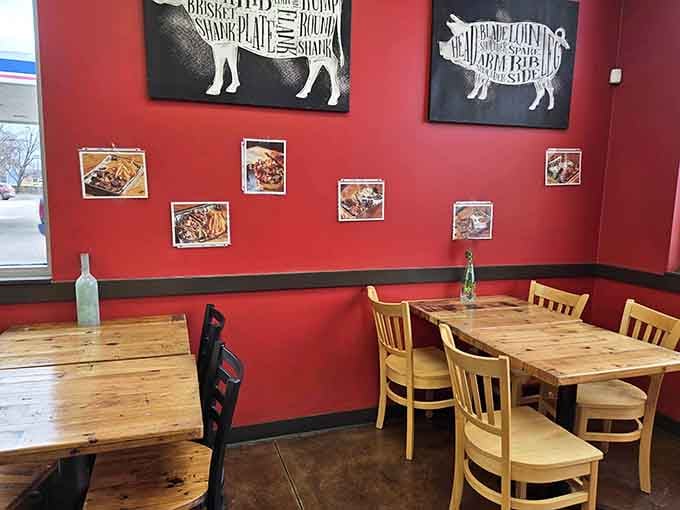 Those rustic wooden tables and red walls create the perfect backdrop for serious barbecue conversations and even better eating.