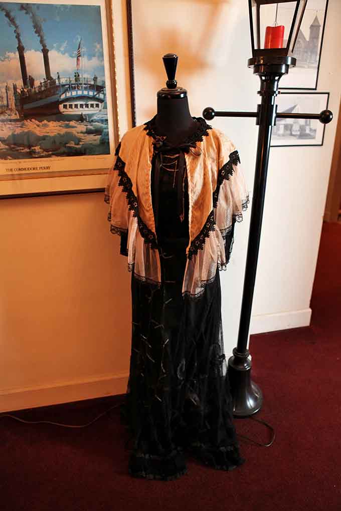 Period mourning attire displayed as if waiting for its owner to return from the great beyond.