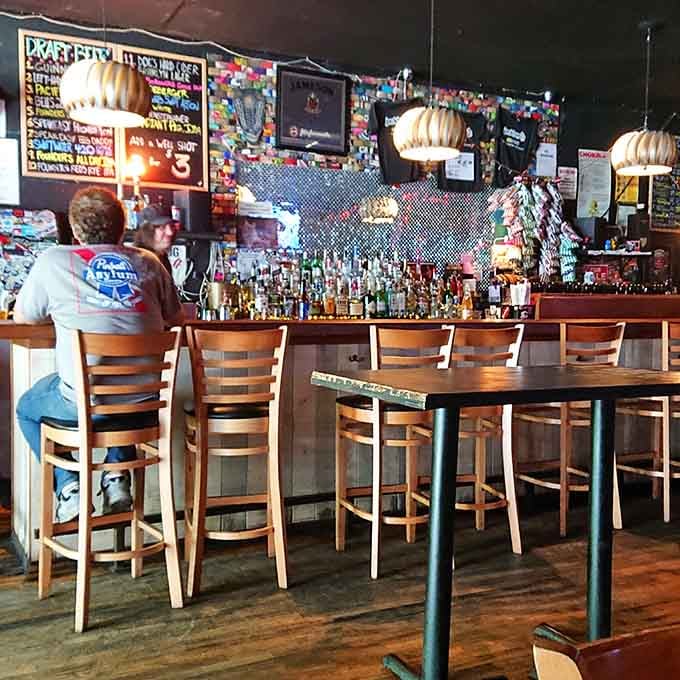 The bar beckons with promise: good drinks, good company, and the soundtrack of silver balls bouncing nearby.