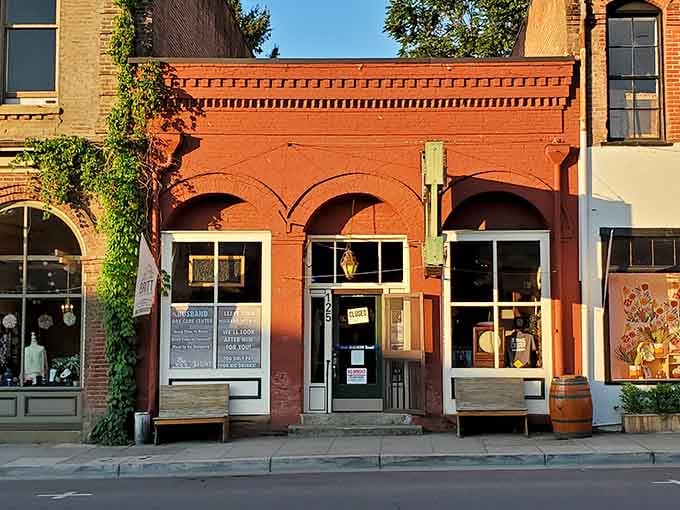 J'Ville Tavern's brick arches frame windows that have watched this town's entire fascinating story unfold over decades.