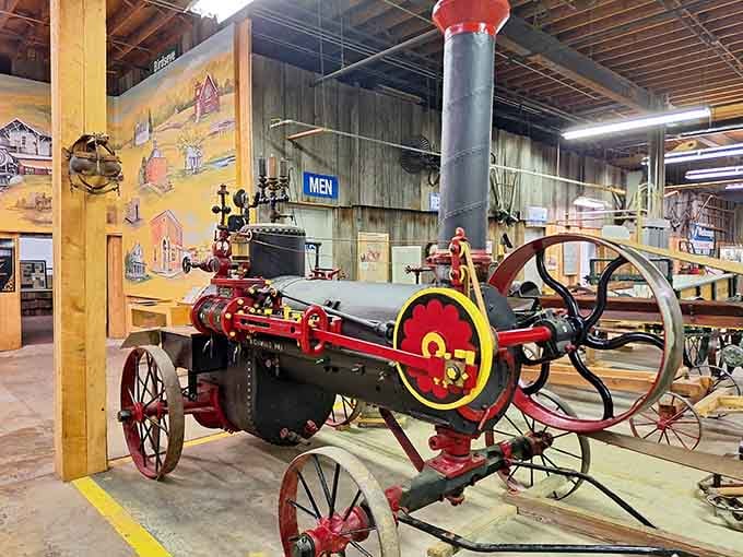 Vintage farm equipment painted bright red reminds you that progress doesn't mean forgetting where we came from entirely.