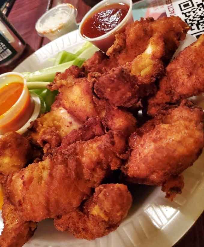 Golden, crispy wings with celery standing guard like little green soldiers ready for ranch dipping duty ahead.