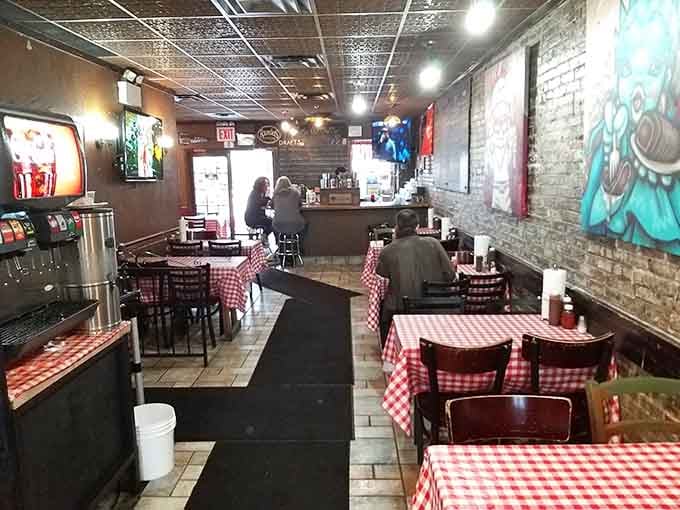 Exposed brick walls and casual seating create the laid-back atmosphere where great barbecue tastes even better with friends.