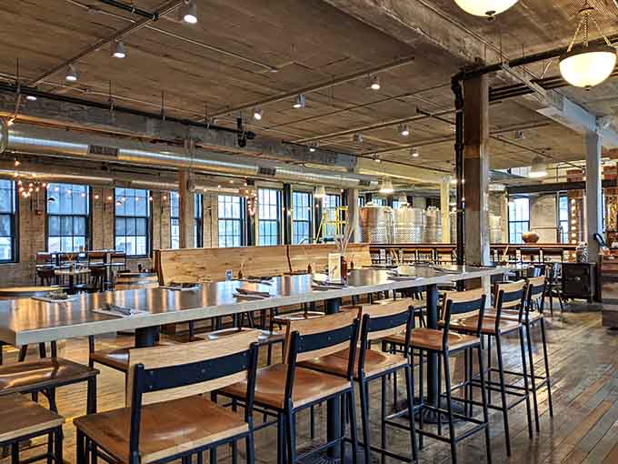 Communal tables and natural light create the kind of space where strangers become friends over shared plates.