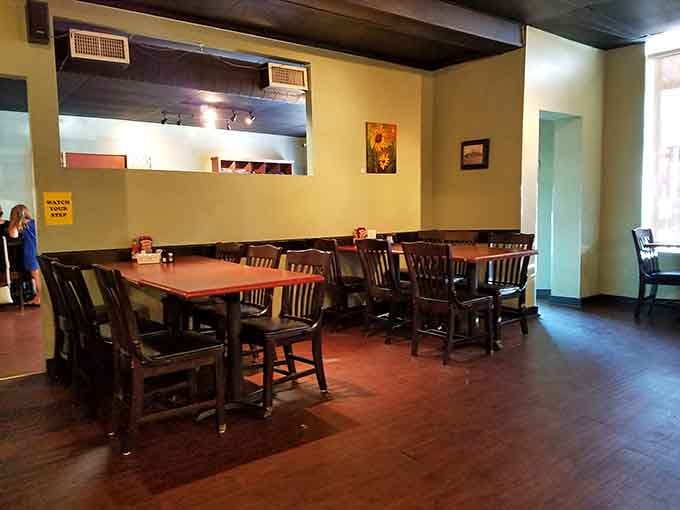 Wooden tables and Southern charm create a dining room where strangers become regulars after just one visit.