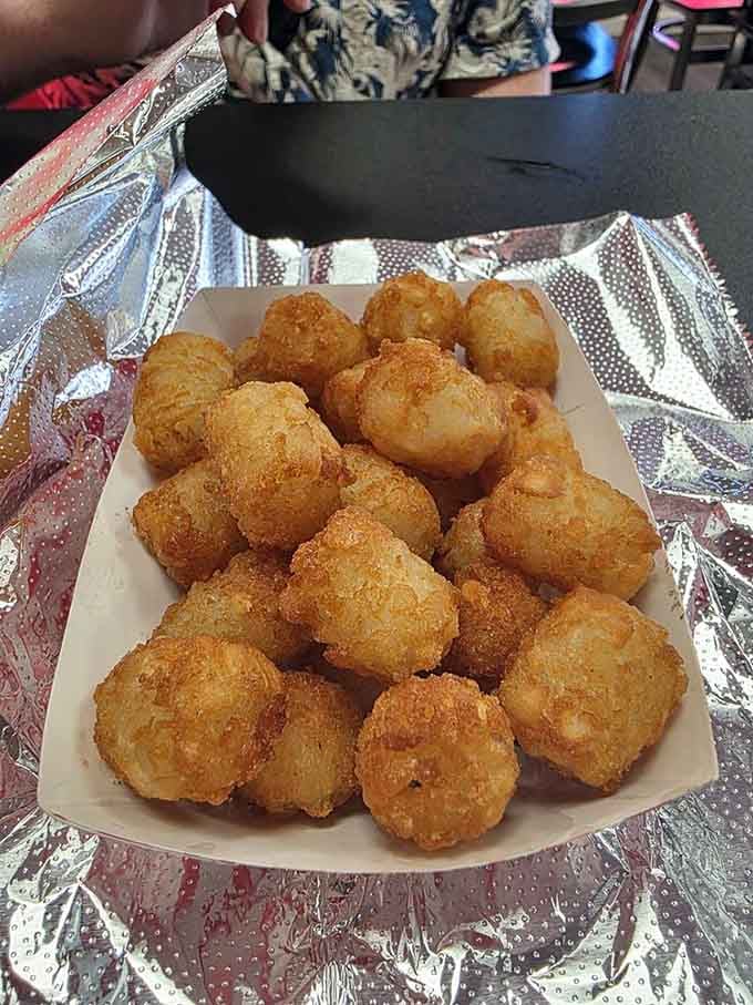 Tater tots this perfectly golden brown deserve their own standing ovation, crispy little pillows of potato happiness on every plate.