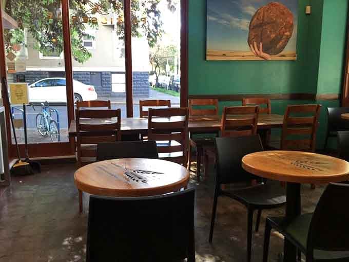 Simple wooden tables where strangers become friends united by their love of really good bread.