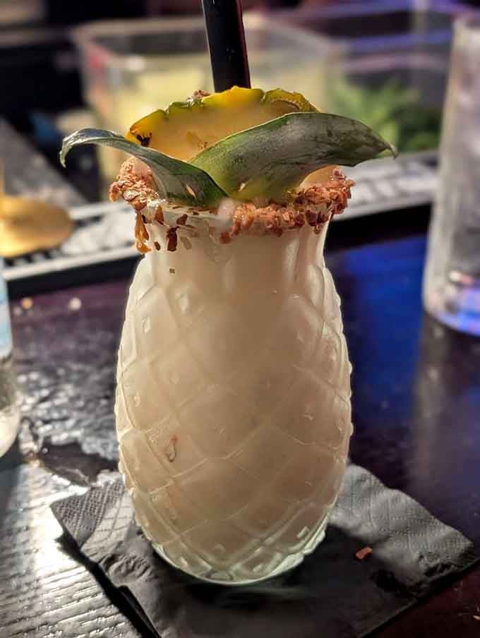 This tropical cocktail in a pineapple cup is basically vacation in a glass, minus the sunburn and airport hassles.