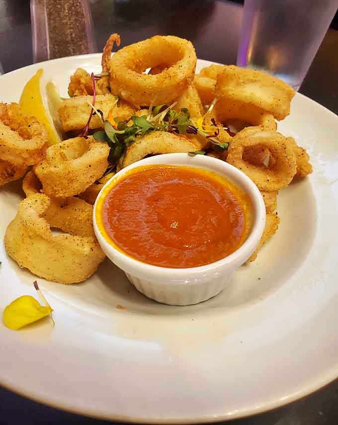 Golden fried calamari with a side of marinara, because some classics don't need reinventing, just proper execution.