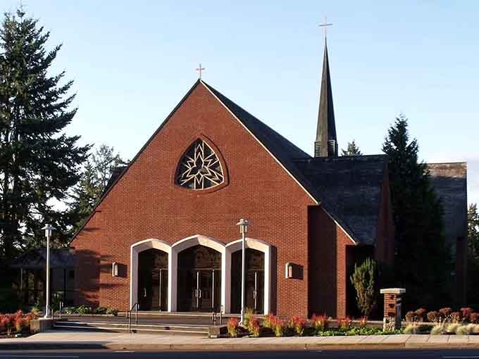 Brick and stained glass combine in architectural harmony that invites contemplation regardless of your personal beliefs or background.