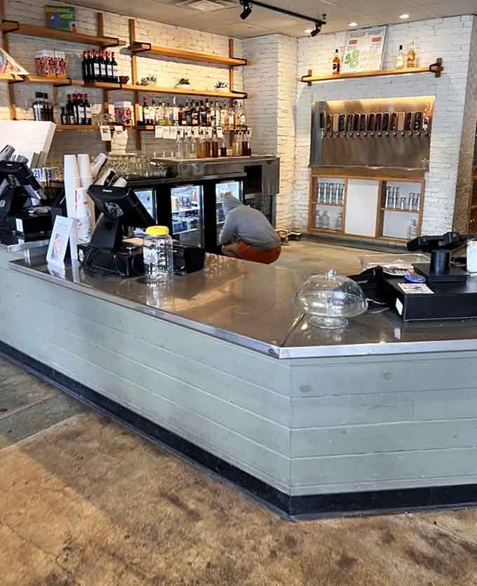 The bar area gleams with promise, offering cold beverages to accompany your impending carbohydrate adventure ahead.