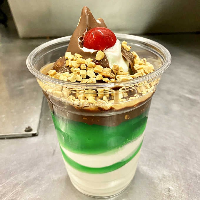 This mint parfait layers green sherbet with vanilla soft serve, creating a refreshing masterpiece that's almost too pretty to eat.
