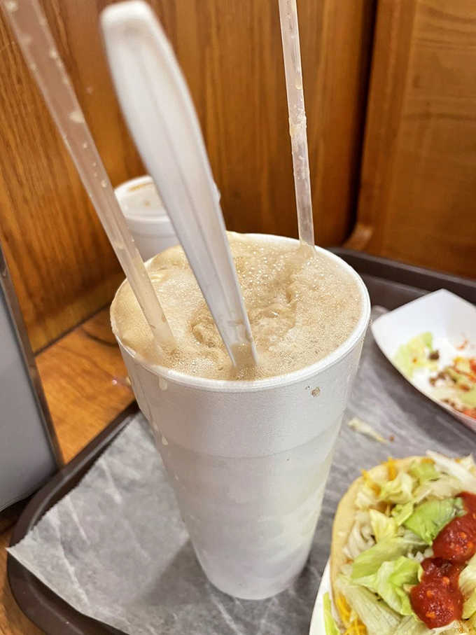 A root beer float so thick your straw stands at attention, the perfect sweet companion.