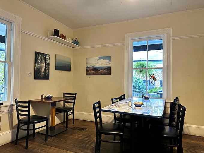 Natural light streaming through those windows makes every table feel like the best seat in the house for your morning meal.