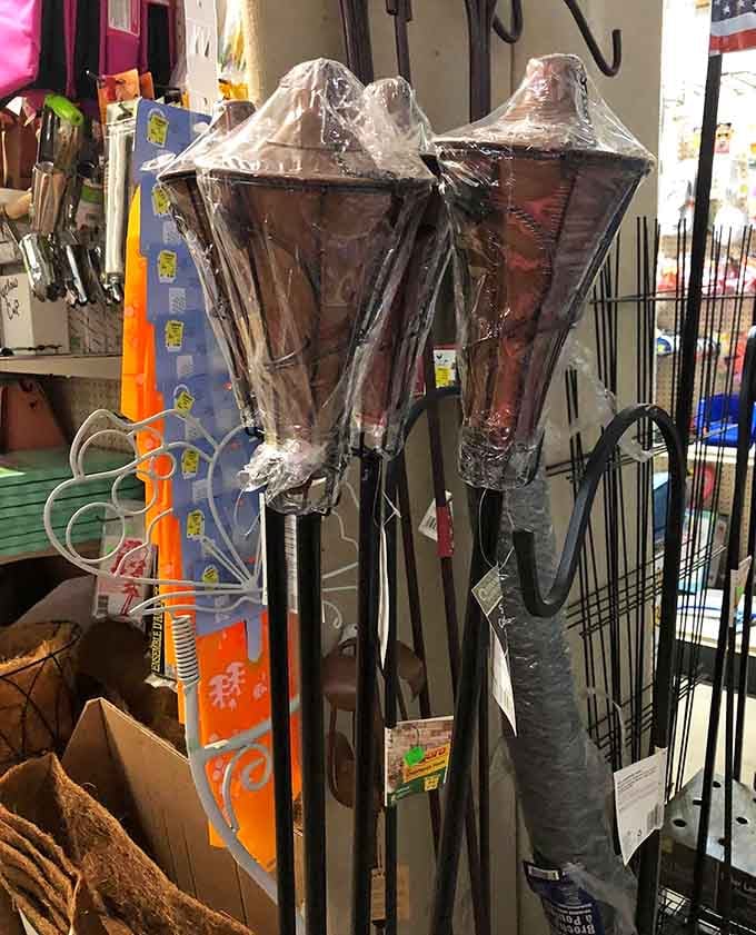 Garden torches wrapped and ready to illuminate your next backyard gathering with style and a touch of tiki flair.