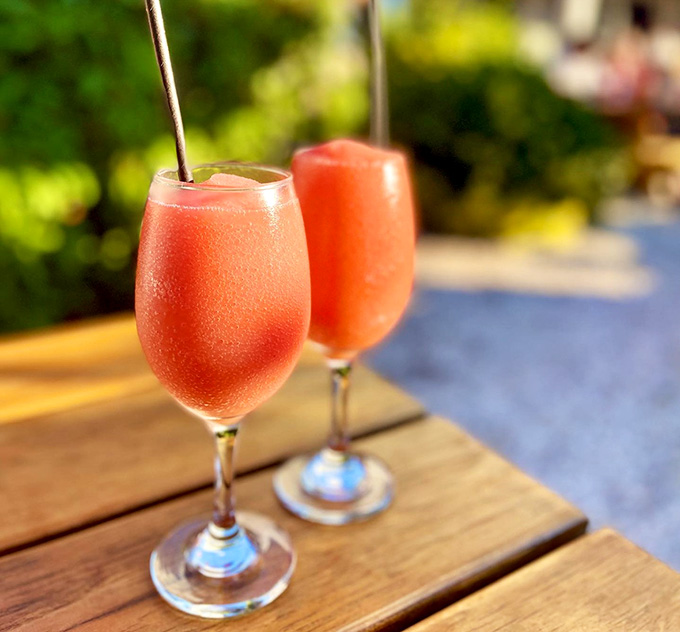 Fros&eacute; in the garden sunshine feels like vacation mode activated, even if you're just on lunch break.