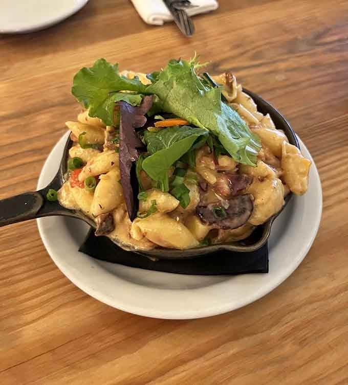 Lobster mac and cheese in a skillet delivers creamy, indulgent comfort with an upscale coastal twist.