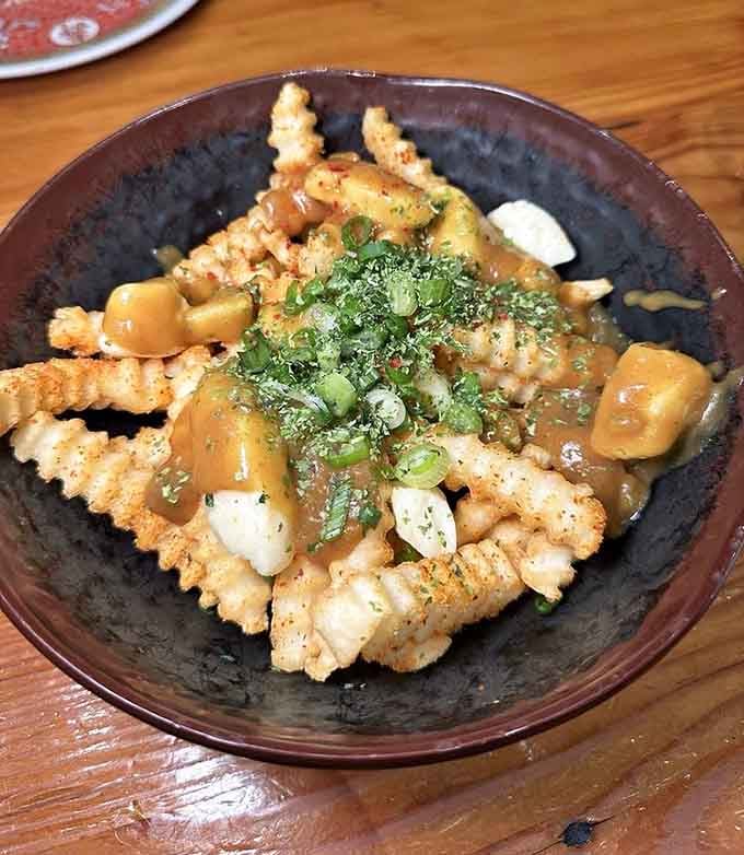 Crispy waffle fries meeting Asian flavors in what might be the most genius fusion ever created.