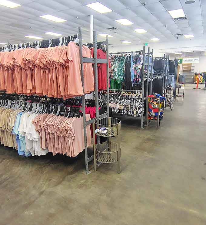 Clothing racks bursting with options in every shade imaginable, like a department store decided to have a clearance sale.