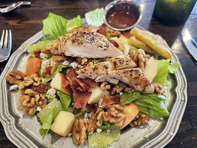 Fresh greens topped with grilled chicken, bacon, apples, and walnuts make salad feel less like diet food, more like celebration.