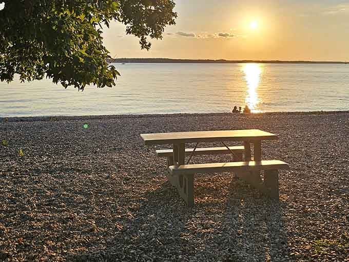 A picnic table, a sunset, and the beach stretching to the horizon equal pure Kentucky magic.