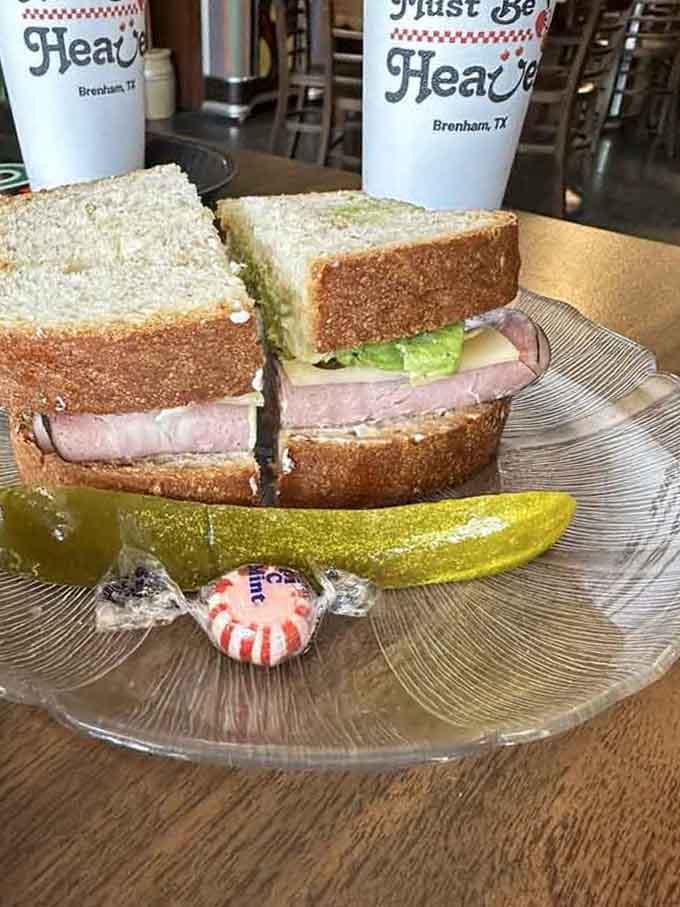 Ham and Swiss on toast with a pickle&mdash;simple pleasures served on a plate, just like grandma intended.