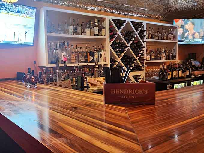 That well-stocked bar promises the perfect pour to complement whatever culinary adventure you're about to embark upon tonight.