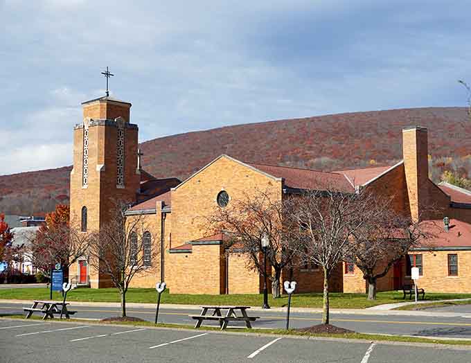 Church architecture that reminds you some things are worth preserving, especially when they anchor a community this beautifully together.
