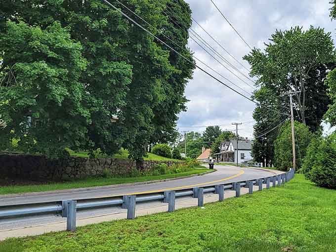 Tree-lined streets curve gently, inviting leisurely drives where the speed limit is actually reasonable and enforced with neighborly waves.