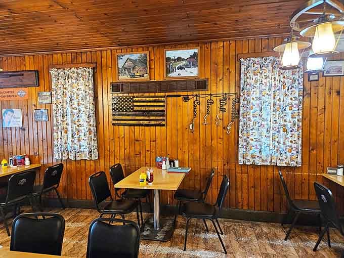 Knotty pine walls adorned with Americana, where every corner tells a story worth hearing over coffee.