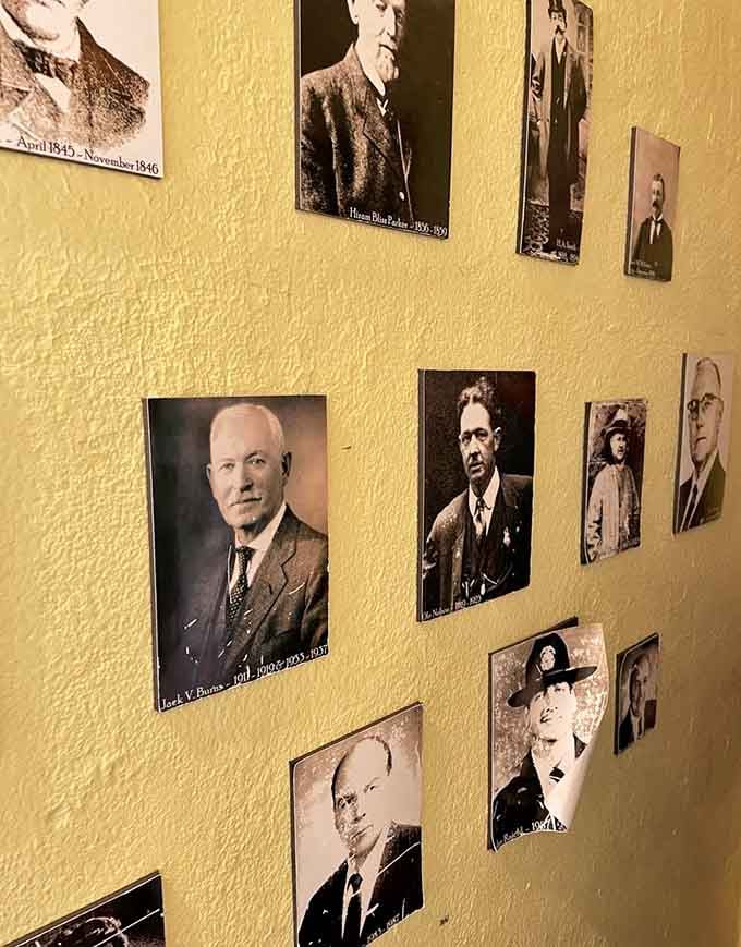 Faces from the jail's real past line the walls, a sobering reminder of the building's authentic history.