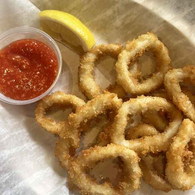Golden calamari rings that prove the ocean's bounty tastes even better when it's been properly introduced to hot oil.