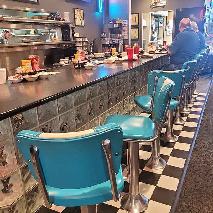 Those turquoise counter stools and checkered floor transport you straight back to when diners knew their purpose perfectly.