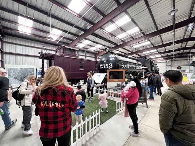 Families gathering around historic locomotives, proving that trains still captivate us like they did our grandparents and their grandparents.