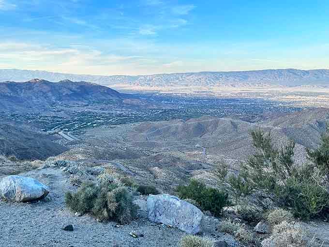 The valley sprawls below like a topographical map come to life, minus the confusing legend.