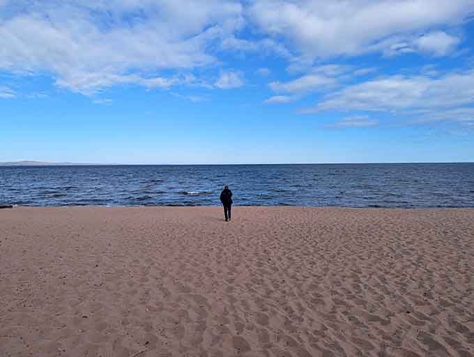 Solitary walks along endless shoreline prove that sometimes the best company is your own thoughts.