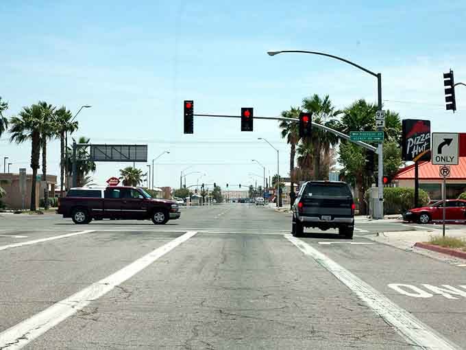 Parker's main intersection: where California dreams meet Lake Havasu reality, complete with swaying palms.