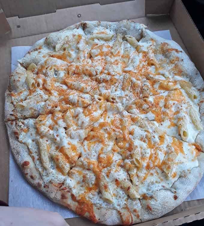 Buffalo chicken pizza with penne pasta shows the kind of creative thinking that separates good pizzerias from great ones.