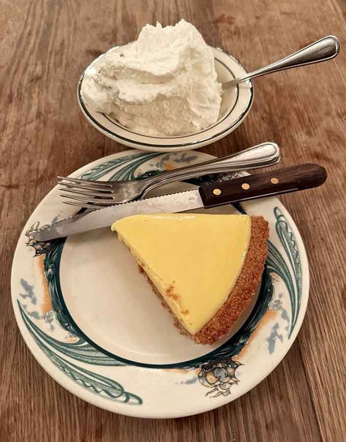 Key lime pie with a mountain of schlag, the perfect sweet ending to your meaty adventure.