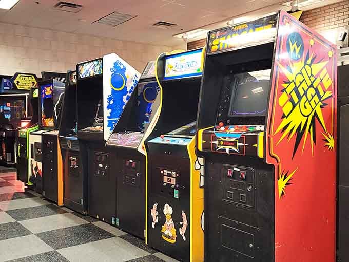 Vintage cabinets showcase gaming history, from simple pixels to the complex adventures we love today.