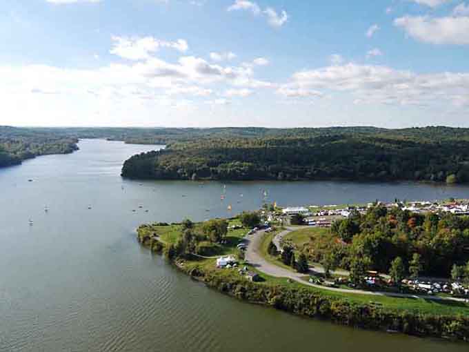 Lake views stretching toward tree-covered hills where the only sound is water lapping and your own contented breathing.