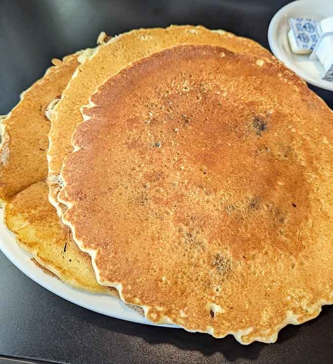 Pancakes so large they could double as frisbees, though eating them is definitely the better option.
