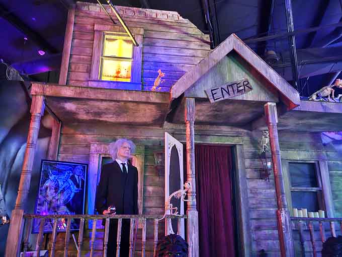 That weathered haunted house entrance looks scarier than your uncle's basement where you stored forgotten board games.