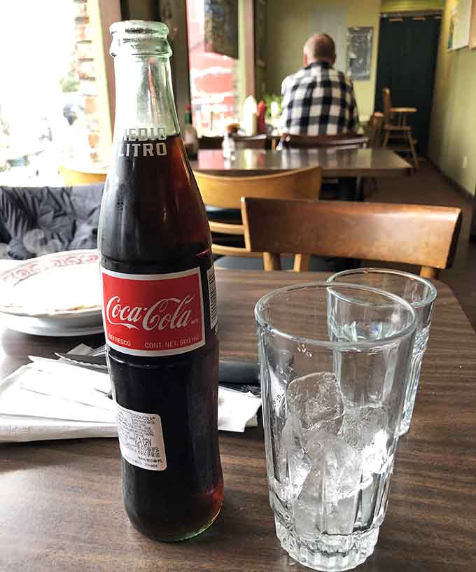 Mexican Coke in a glass bottle, because some traditions are worth keeping alive and well.