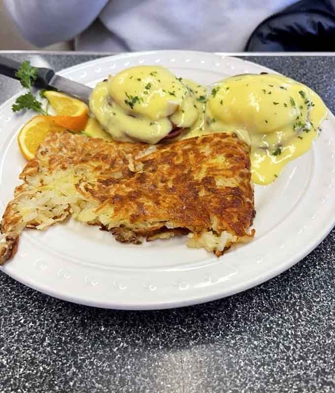 Hollandaise cascading over poached eggs and hash browns is the kind of indulgence that makes mornings worth celebrating.