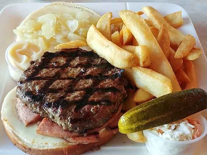 The Trenton Burger arrives loaded with all the fixings, making salads everywhere feel deeply inadequate.