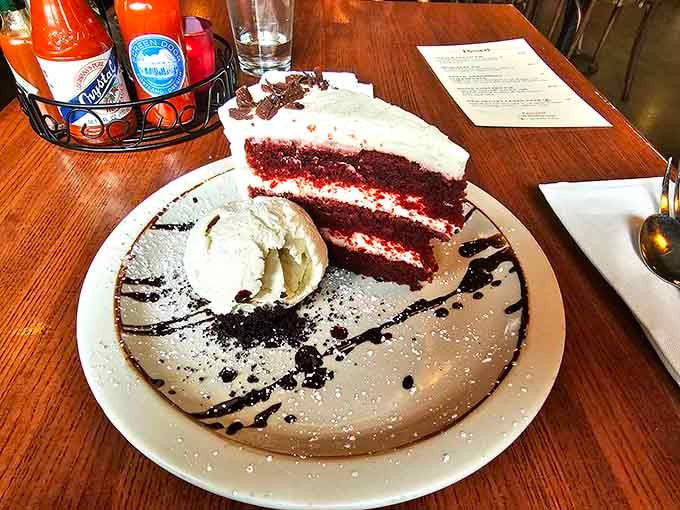 Red velvet cake this tall requires commitment, stretchy pants, and possibly a designated driver for your food coma.