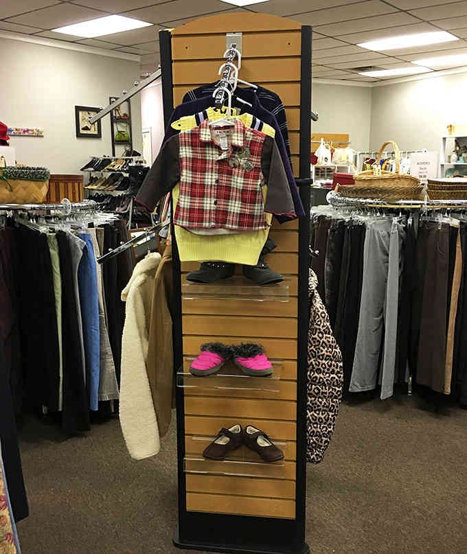 From plaid shirts to bright yellow tees, this display shows how thrift shopping dresses the whole family beautifully.